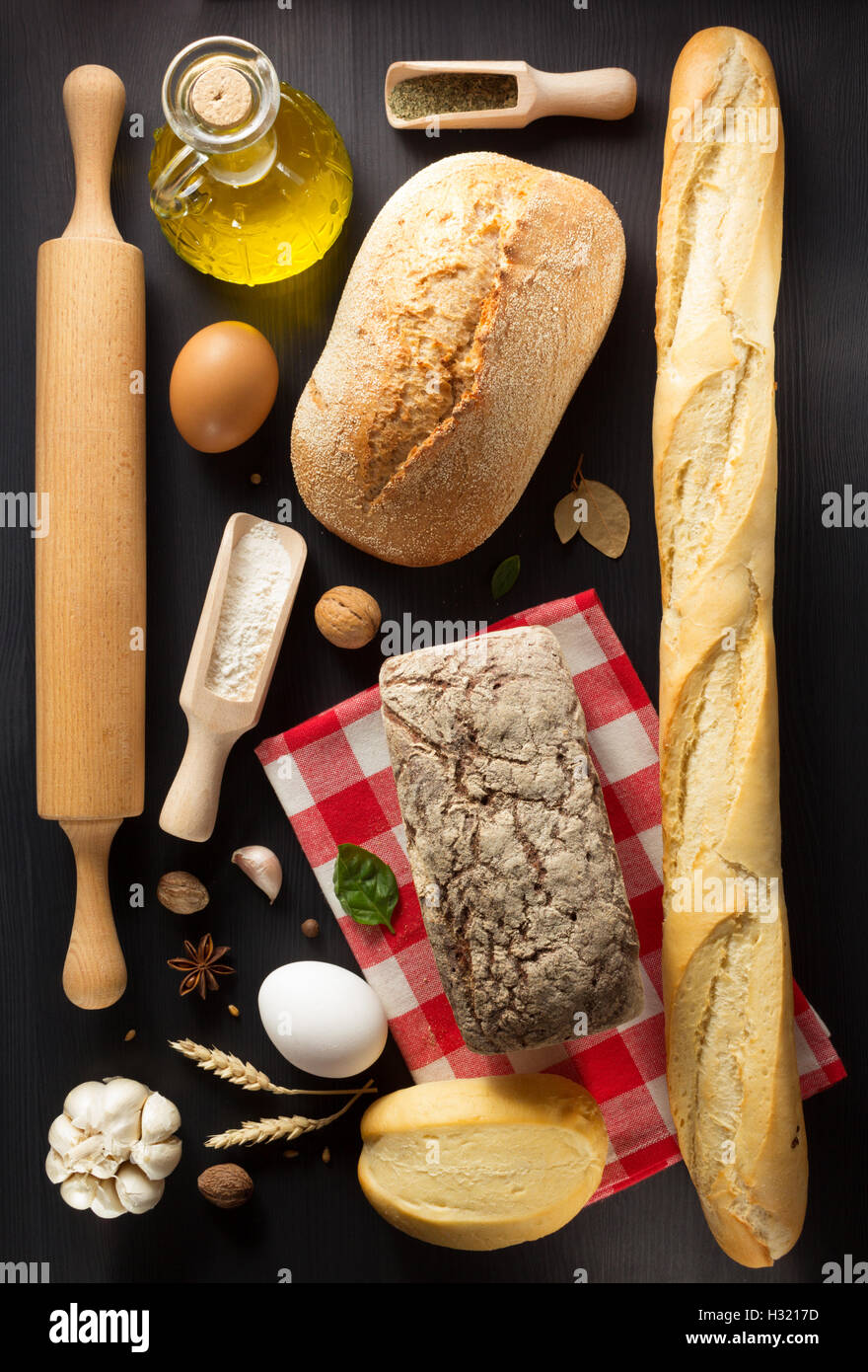 bread and bakery products on wooden background Stock Photo - Alamy