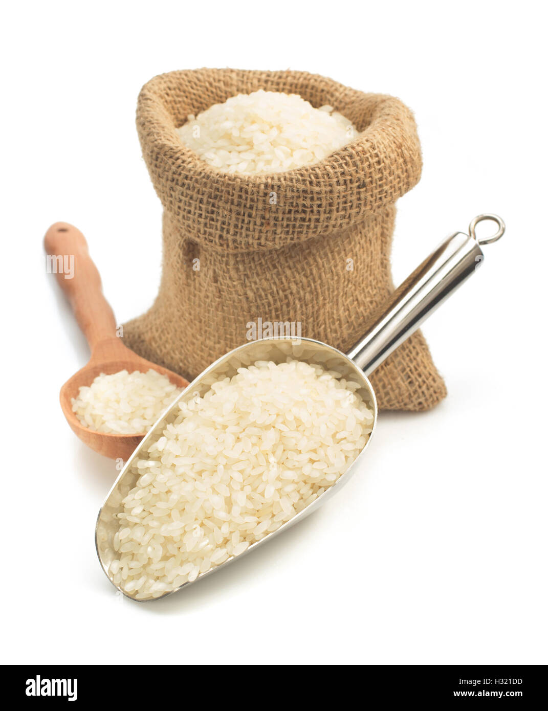 rice in scoop isolated on white background Stock Photo - Alamy