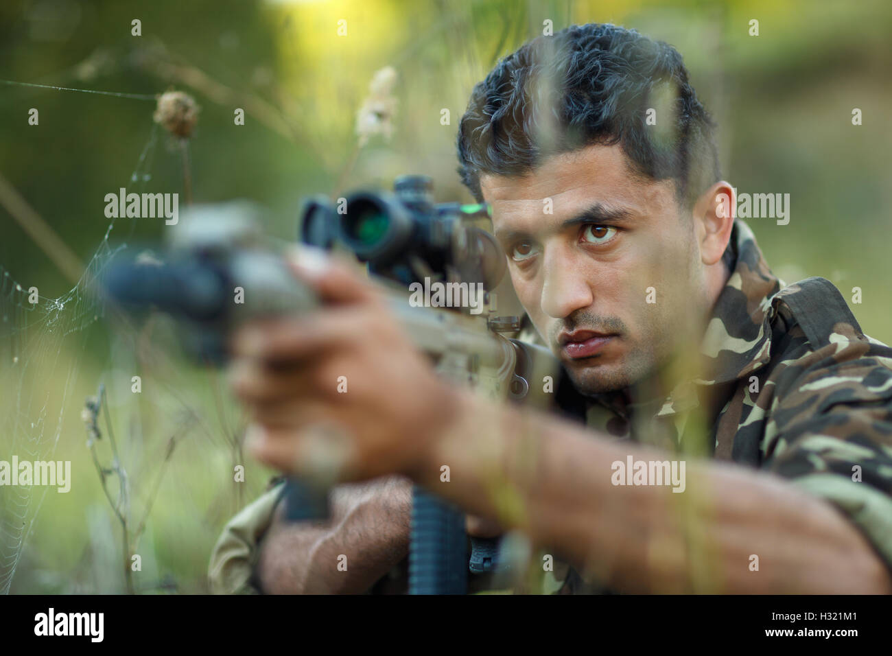 Arab man gun hi-res stock photography and images - Alamy