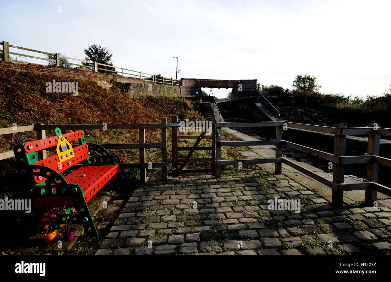 The newly installed "Meccano" bridge overlooks continuing restoration ...