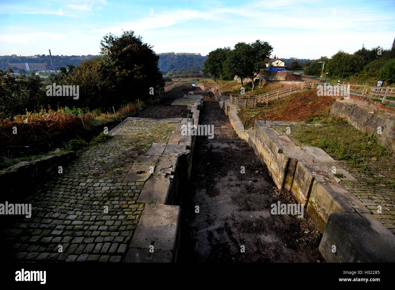 The newly installed "Meccano" bridge overlooks continuing restoration ...