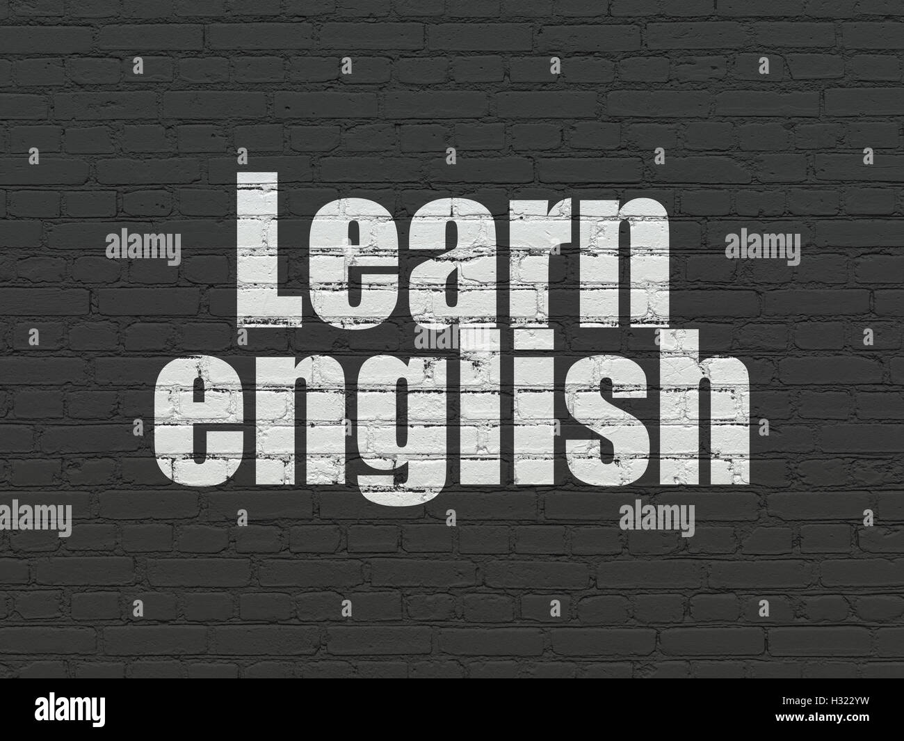 Learning concept: Learn English on wall background Stock Photo - Alamy