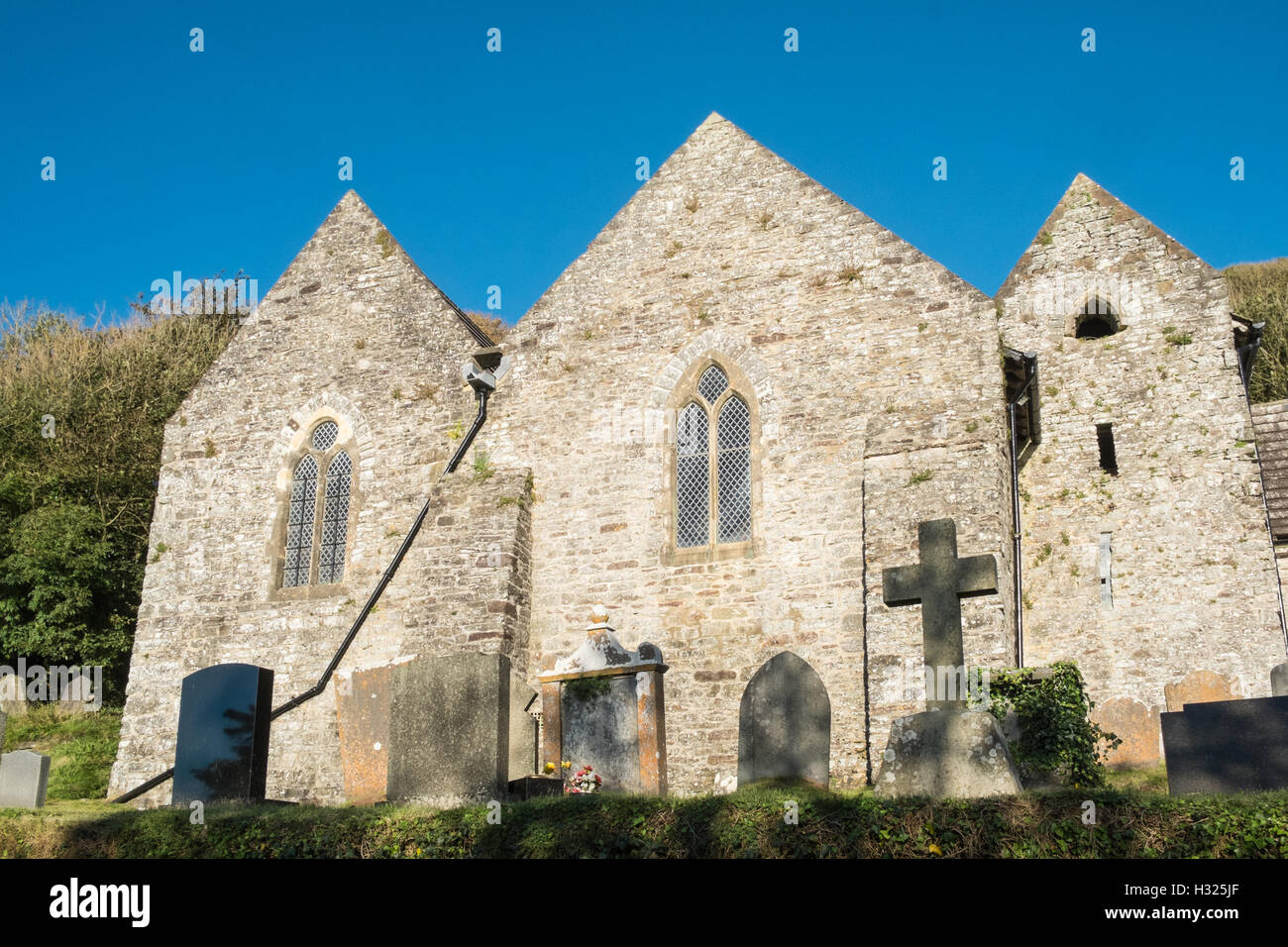 Parish church of Saint,St Ishmael,above River Towy,Tywi, estuary near ...