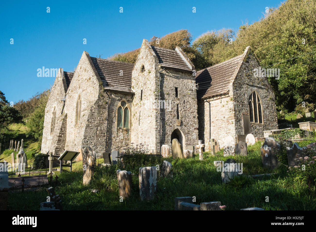 Parish church of Saint,St Ishmael,above River Towy,Tywi, estuary near ...