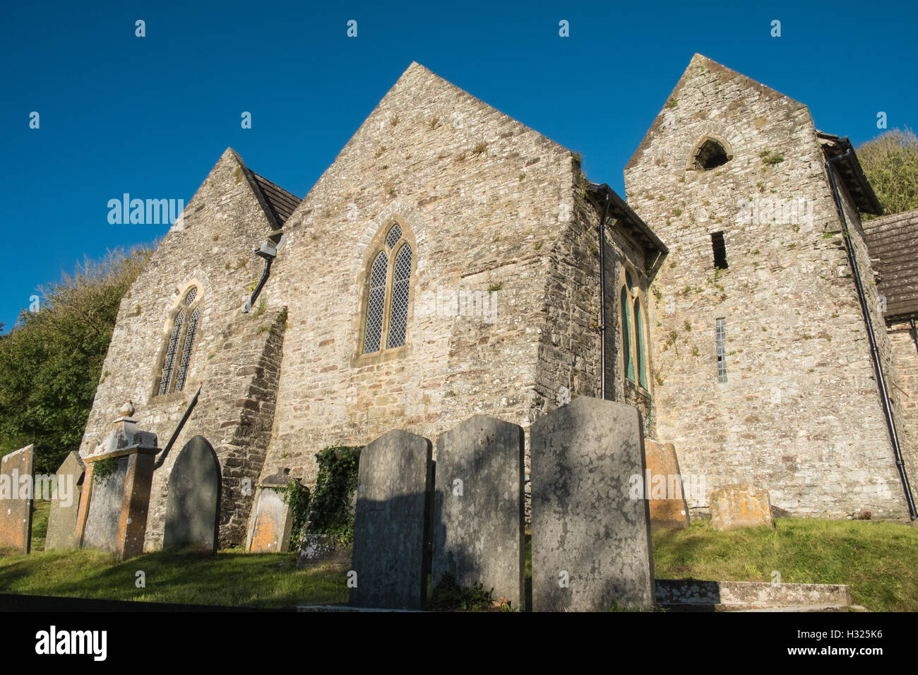 Parish church of Saint,St Ishmael,above River Towy,Tywi, estuary near ...