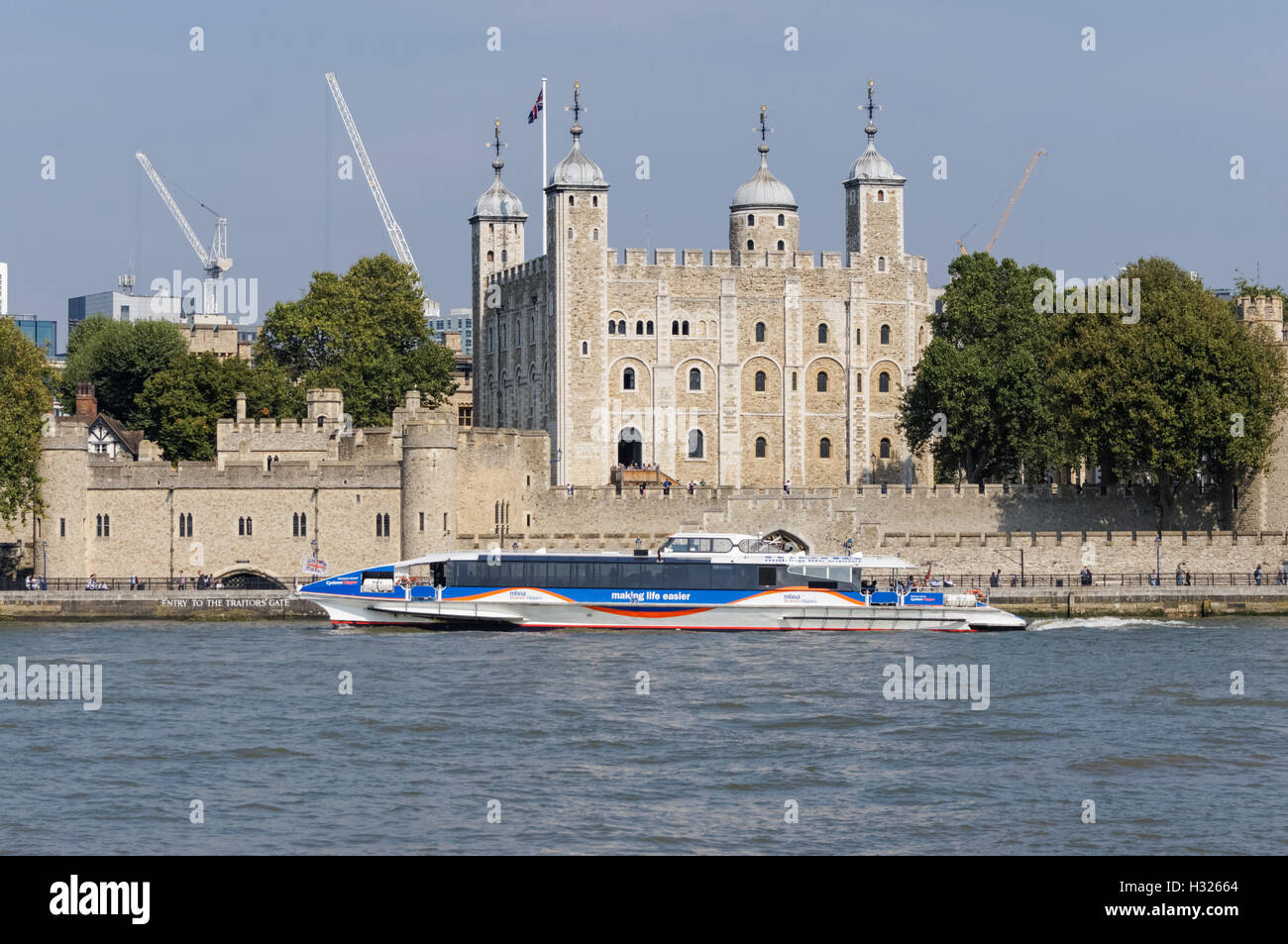 The Tower of London and Thames clipper, London England United Kingdom ...