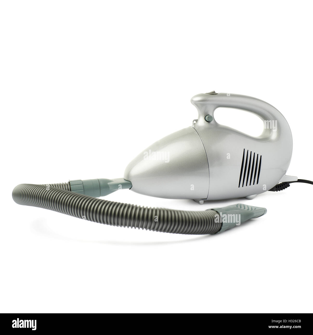 Hand held small vacuum cleaner isolated over the white background Stock ...