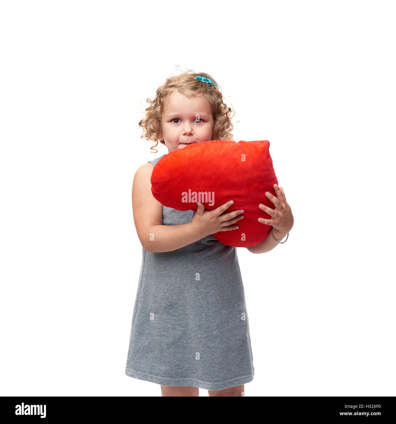 Young little girl standing over isolated white background Stock Photo ...