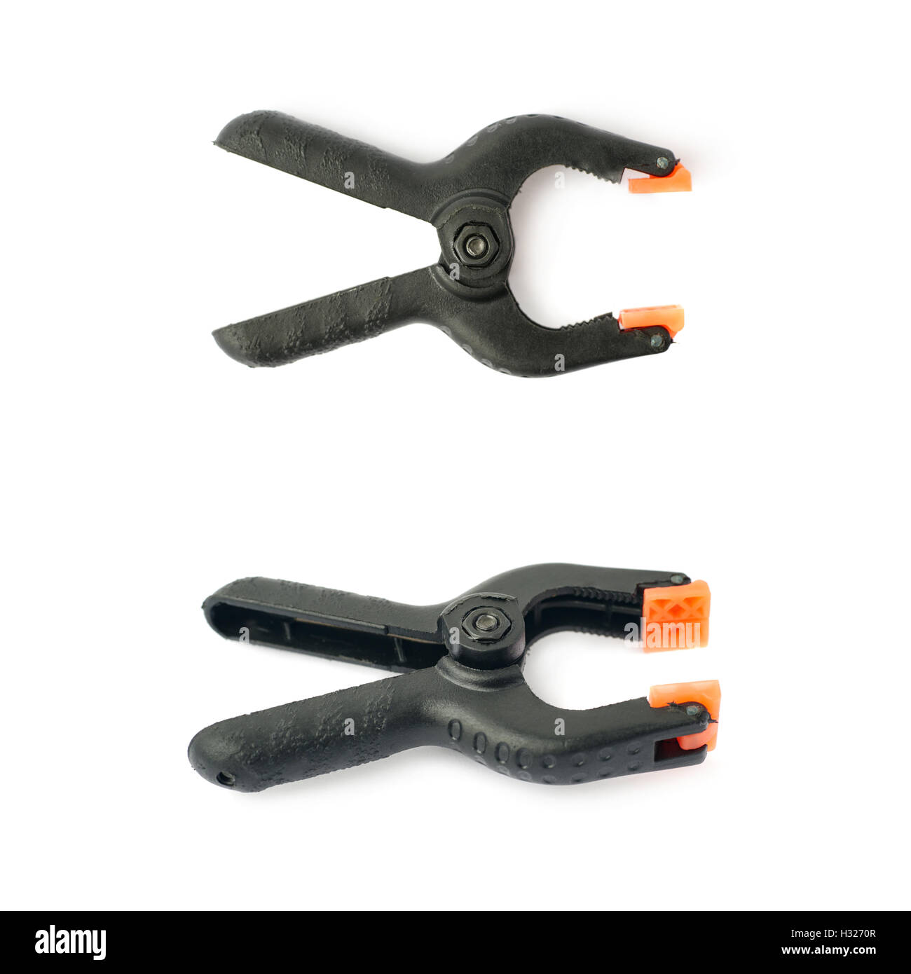 Set of Clamp with orange plastic jaws, isolated over the white ...