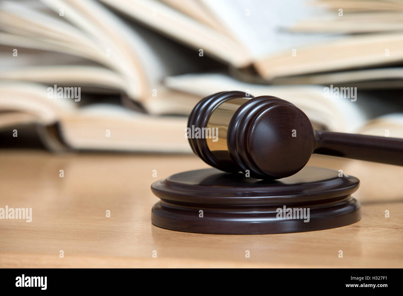 wooden gavel and books Stock Photo - Alamy
