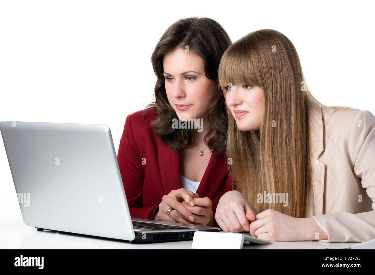 Two women laptop Stock Photo - Alamy