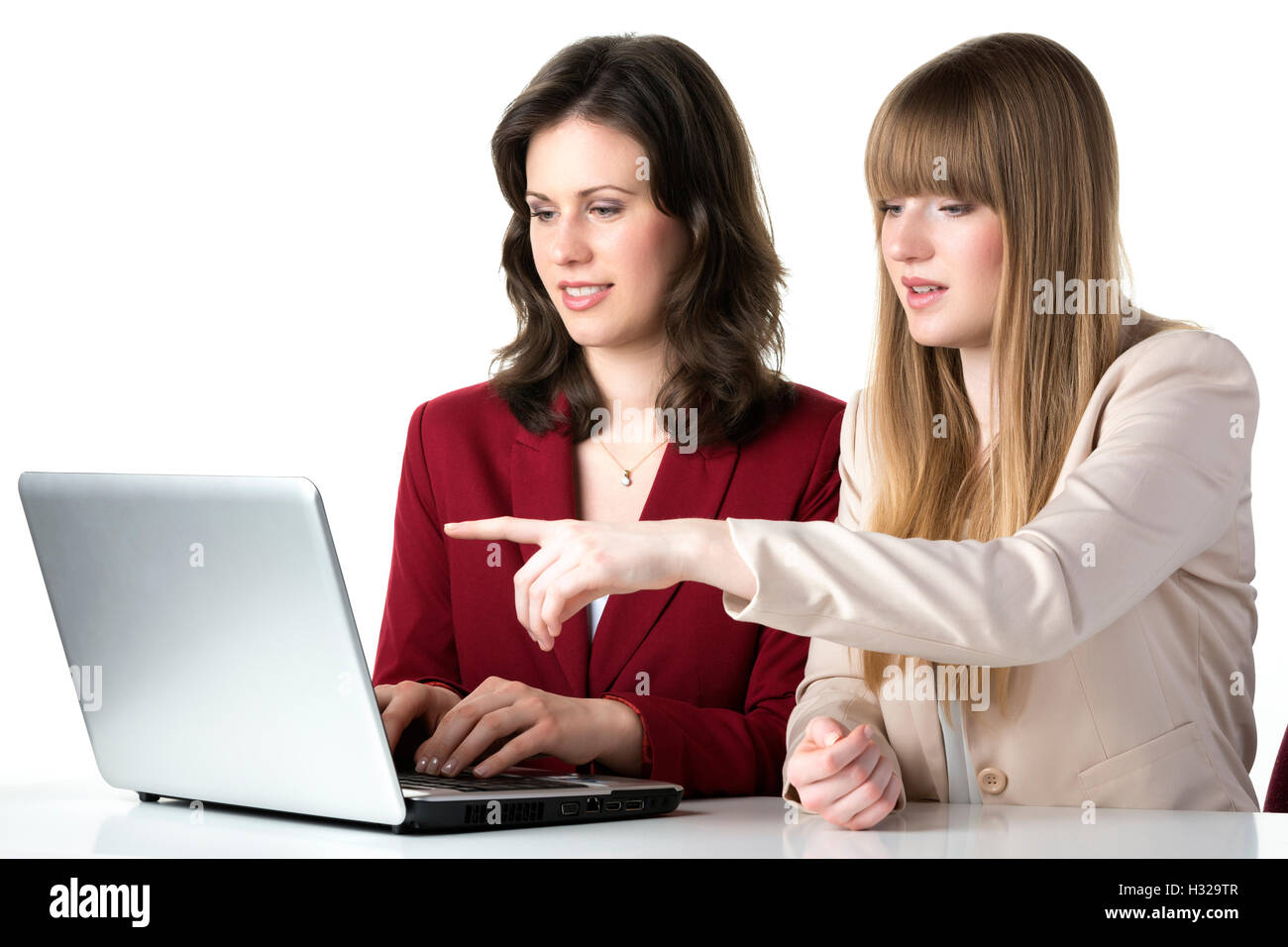 Two women laptop Stock Photo - Alamy