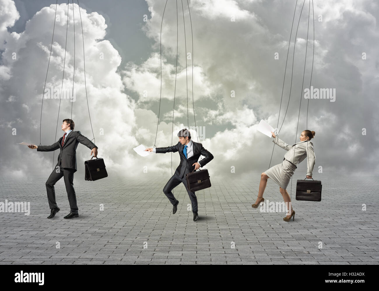 Controlling puppets hi-res stock photography and images - Alamy