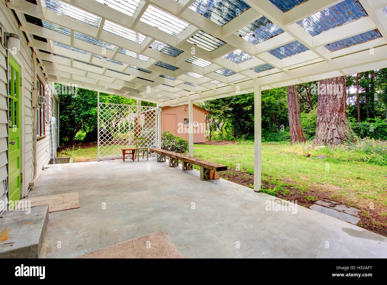 Countryside house. Big porch Stock Photo - Alamy