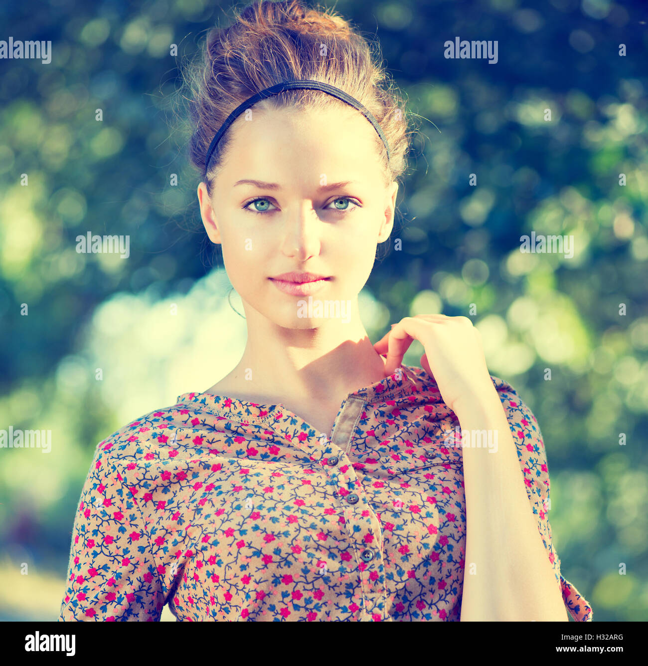 Beauty Teenage Model Girl over Nature Green Background Stock Photo - Alamy