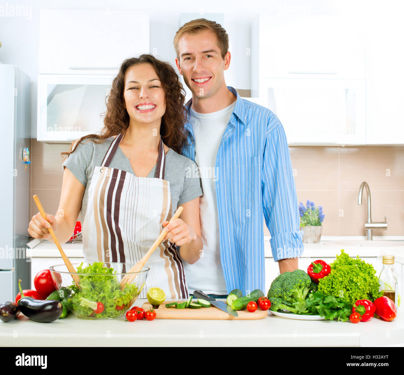 Happy Couple Cooking Together. Dieting. Healthy Food Stock Photo - Alamy