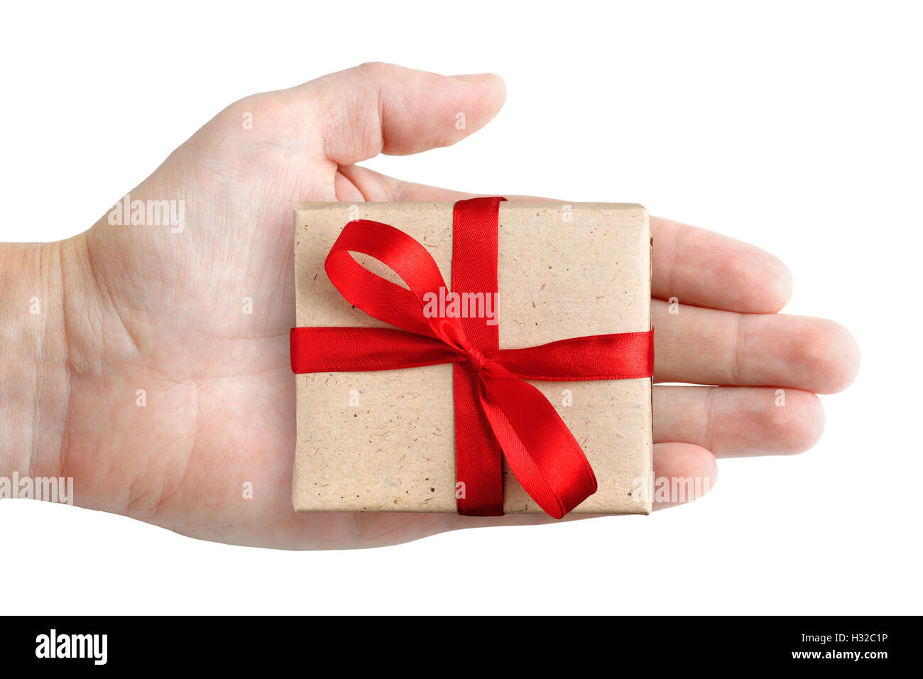 Gift box in hand isolated on white background Stock Photo - Alamy