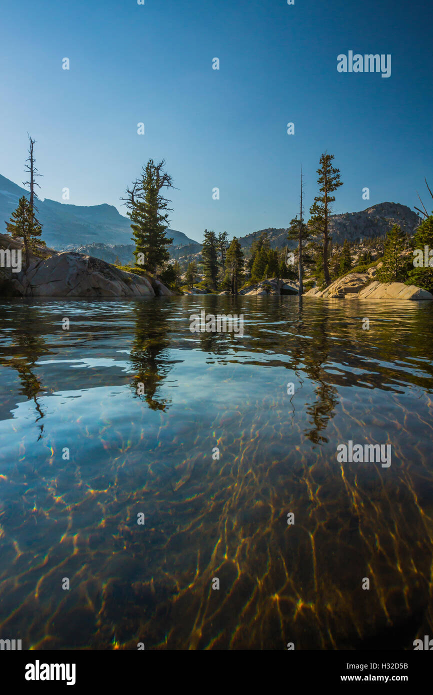 Water and granite at the shore at Ropi Lake in the Desolation ...