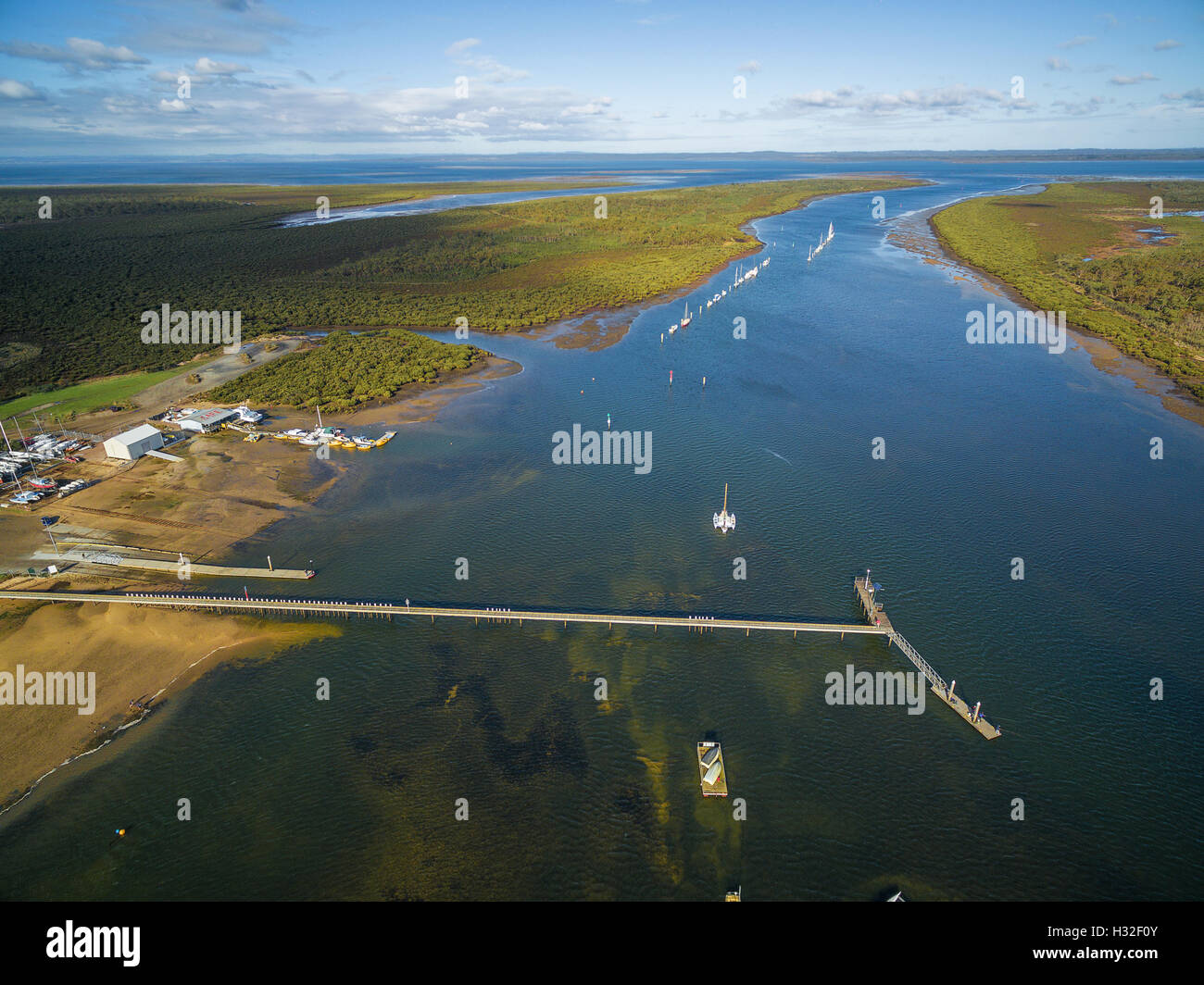 Aerial view of Warneet pier, mangroves, and ocean inlet. Melbourne ...