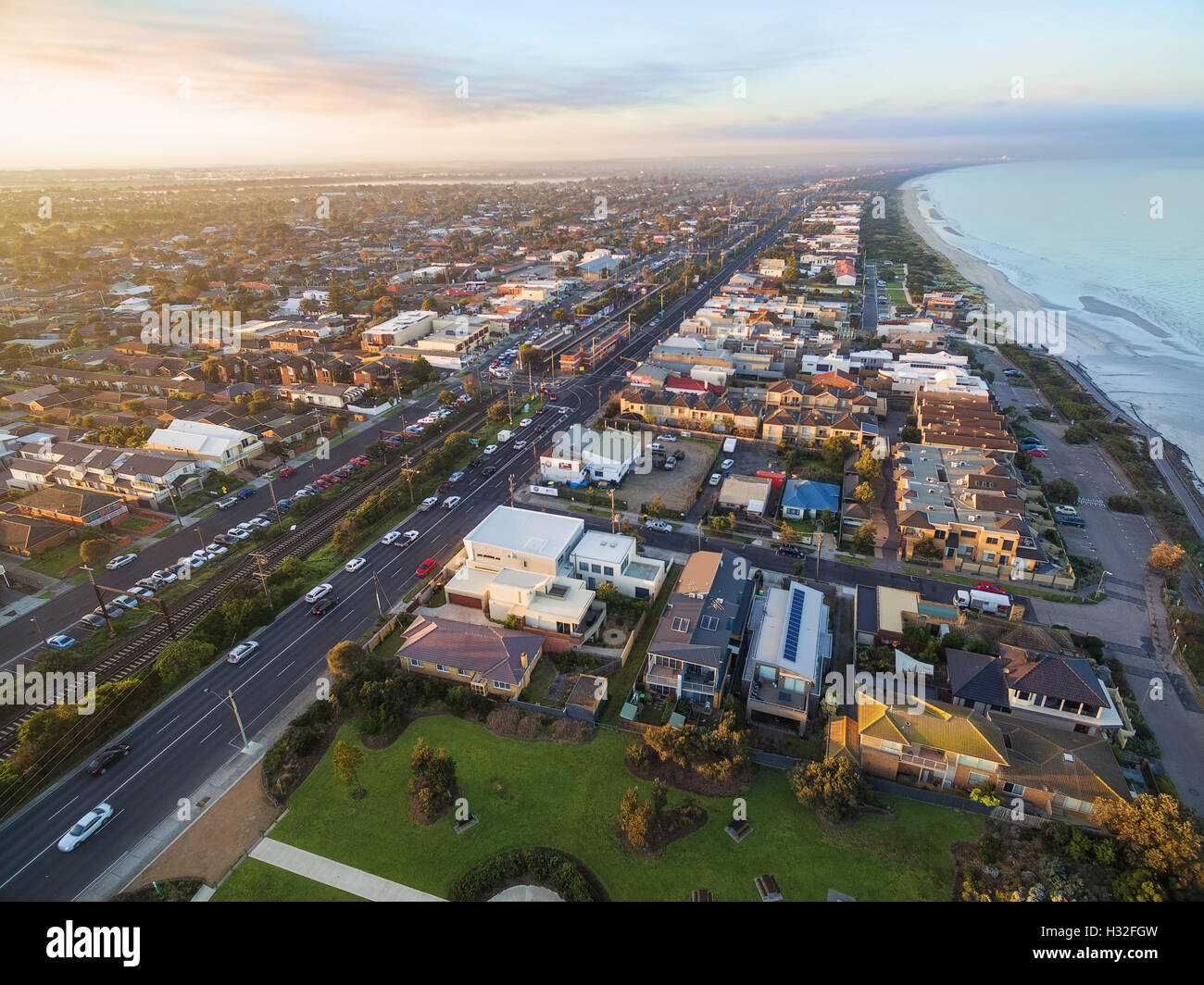 Aerial view of Patterson Lakes suburb and Nepean Highway at sunrise ...