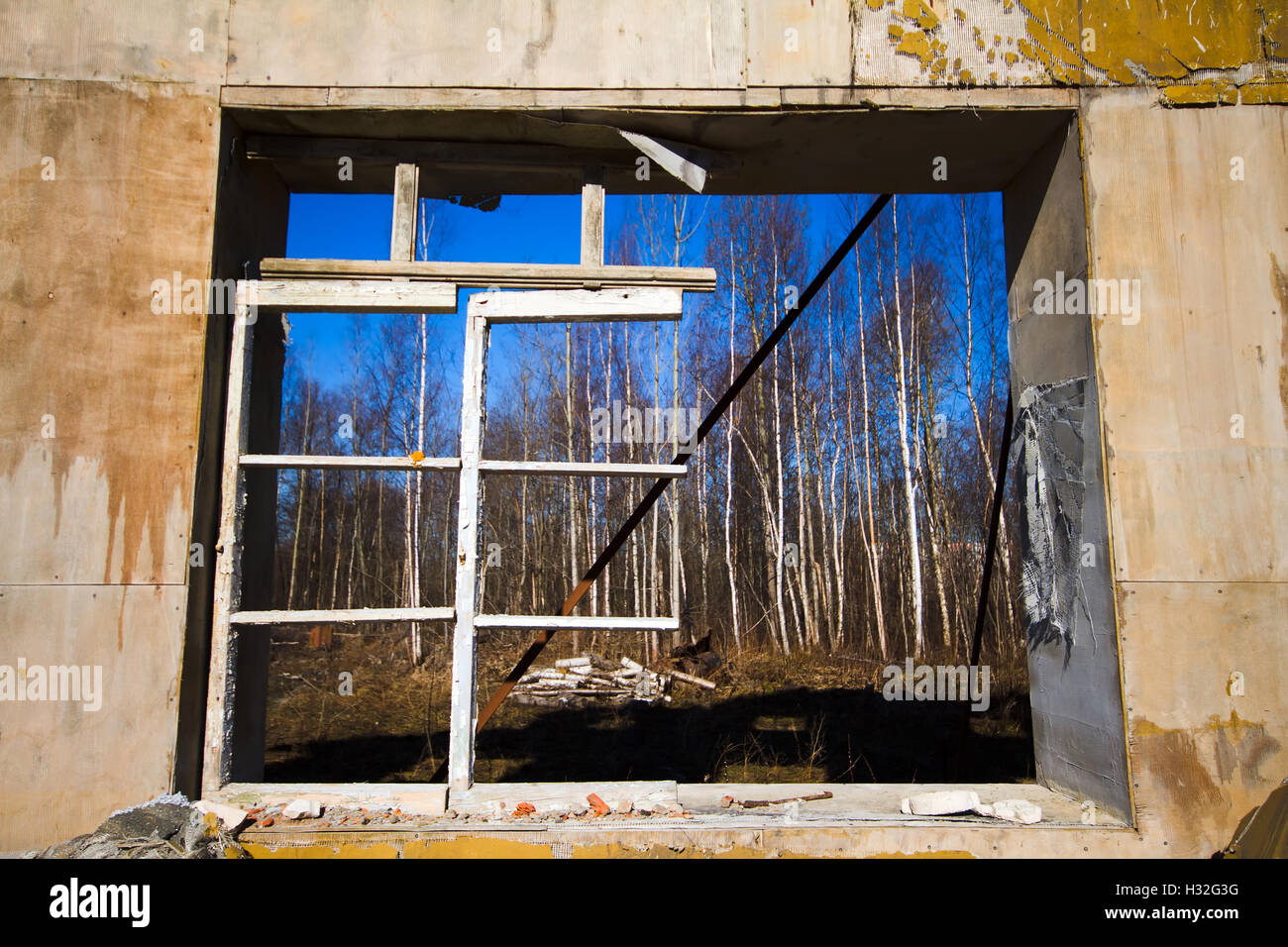 broken window in a wall of the collapsed house Stock Photo - Alamy