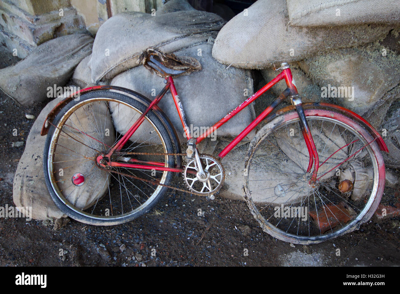 the old broken bicycle at a wall Stock Photo - Alamy