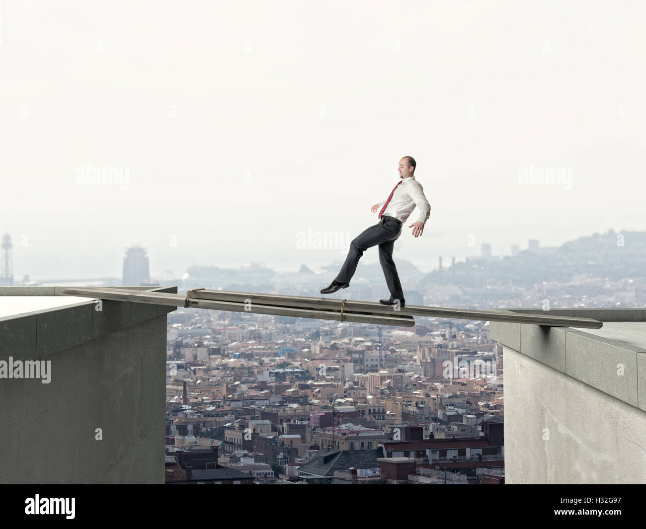 business man walk on danger improvised bridge Stock Photo - Alamy