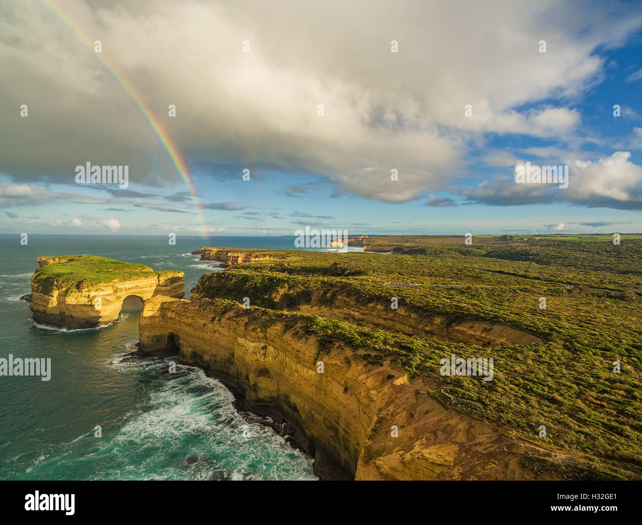 Aerial view of rainbow after the rain over Mutton Bird Island. Great ...
