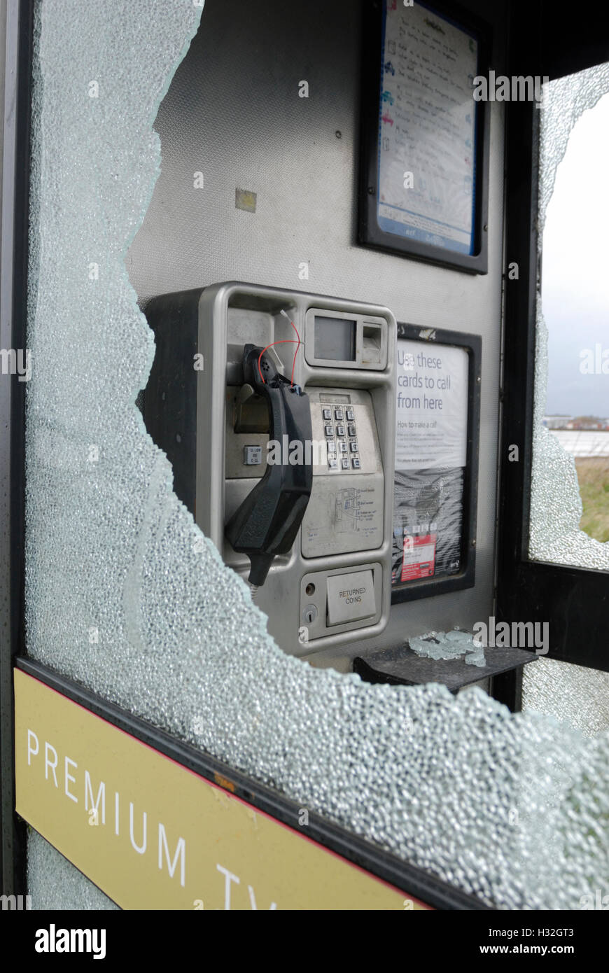 Vandalized telephone box Stock Photo - Alamy