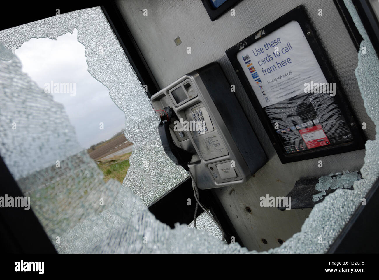 Vandalized telephone box Stock Photo - Alamy
