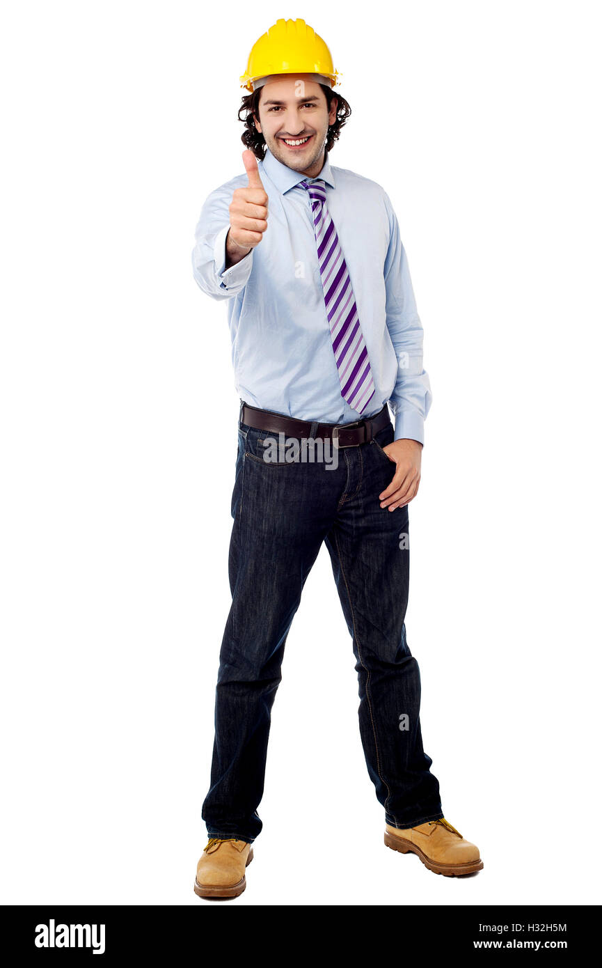 Young engineer with thumbs up Stock Photo - Alamy