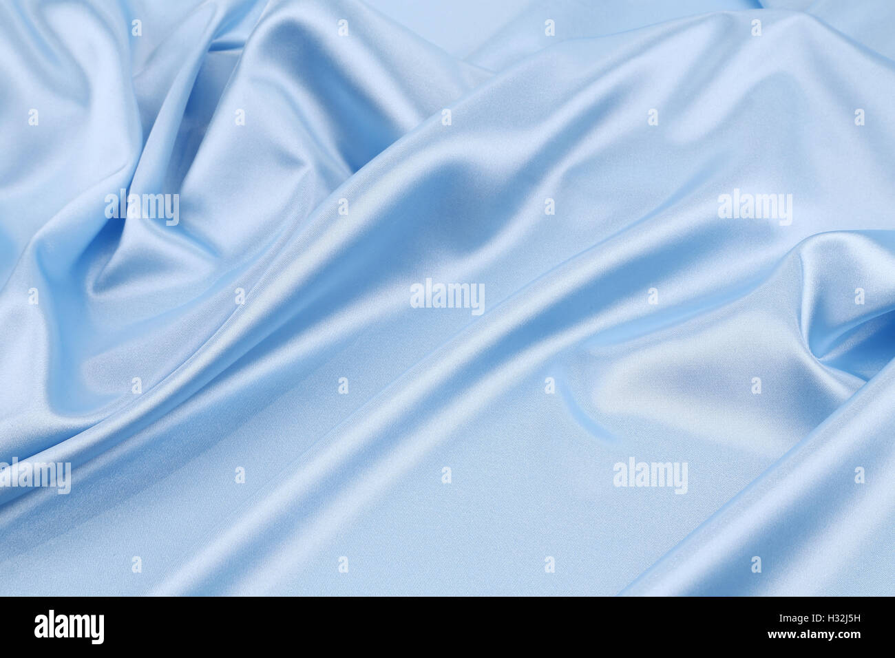 Blue silk background Stock Photo - Alamy