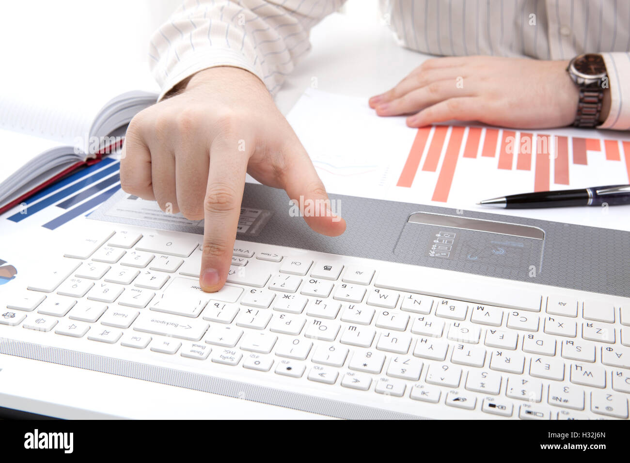 human hands on the notebook keyboard Stock Photo - Alamy