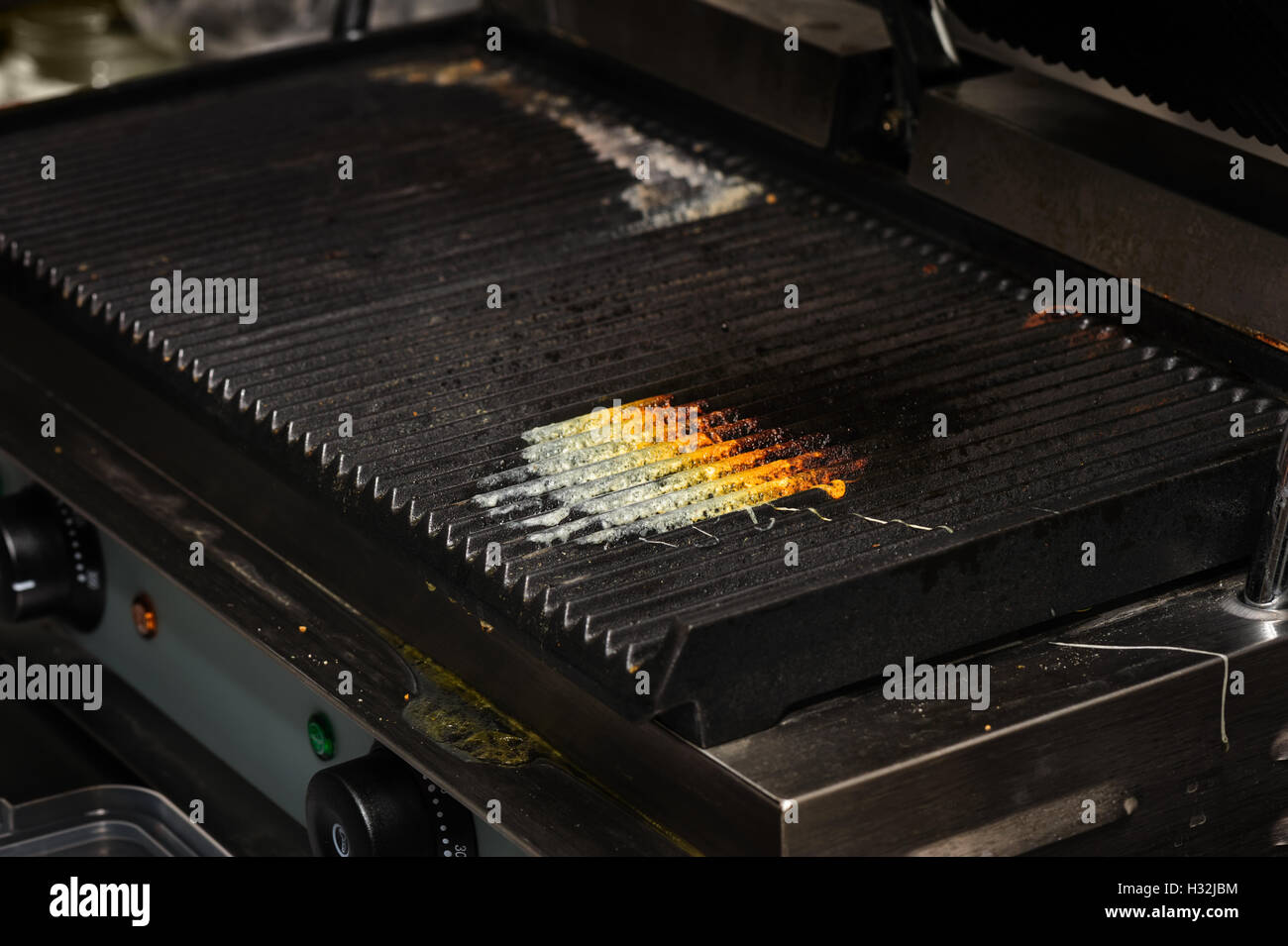 dirty kitchen grill Stock Photo - Alamy