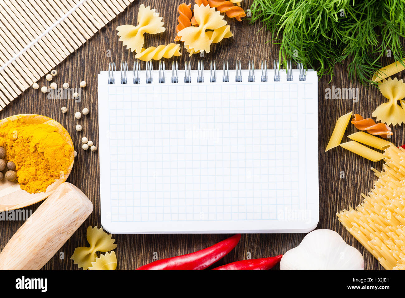 spices and vegetables around notebook Stock Photo - Alamy