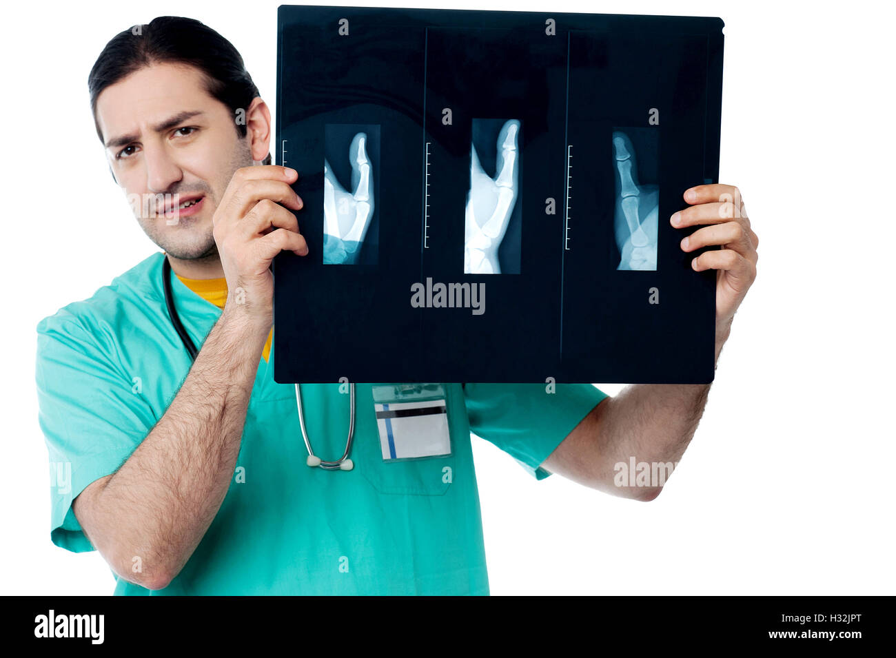 Male doctor observing x ray image Stock Photo - Alamy