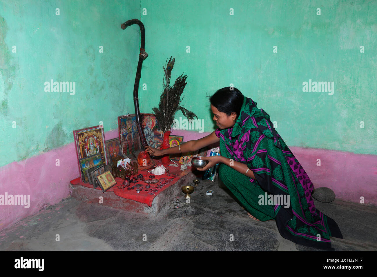 Woman worshiping Devacha Danda (House God), KOLAM TRIBE, Mandawa ...