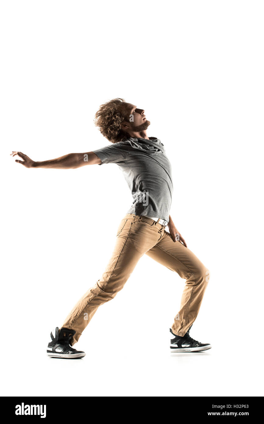 Young street style dancer posing on studio background Stock Photo - Alamy