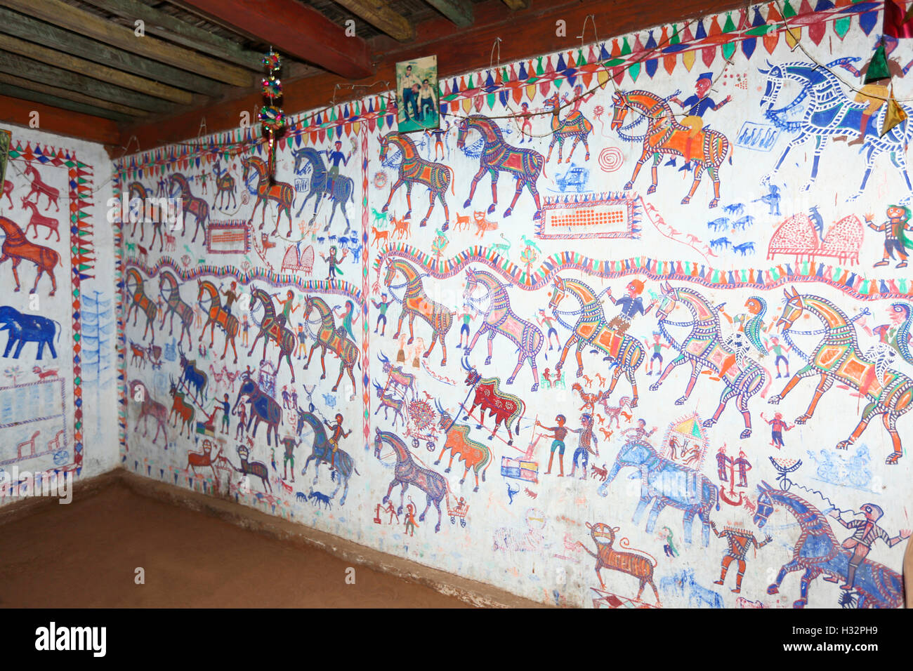 Pithora painting on the wall of tribal house, RATHAWA TRIBE, Gadhiya ...