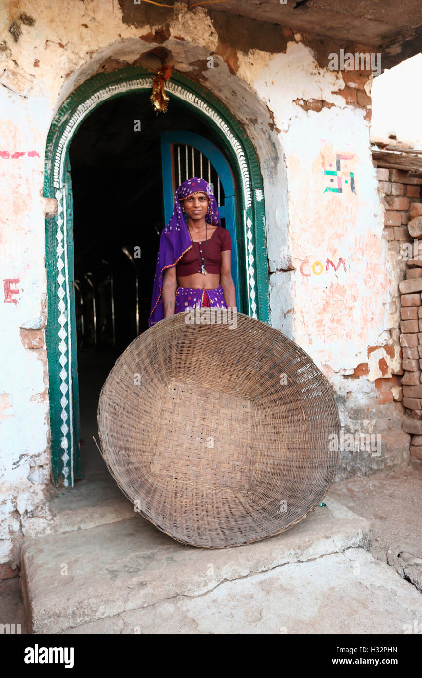 Woman with a big bamboo basket, RATHAWA TRIBE, Gadhiya Village, Dhari ...