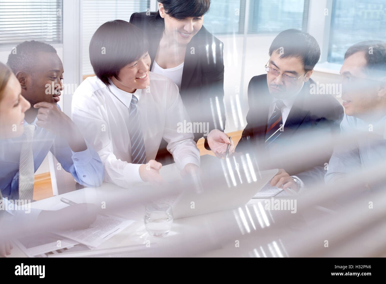 Meeting behind blinds Stock Photo - Alamy