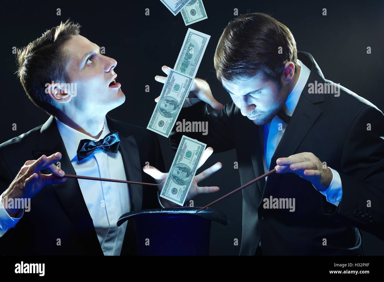 Tricks with dollars Stock Photo - Alamy