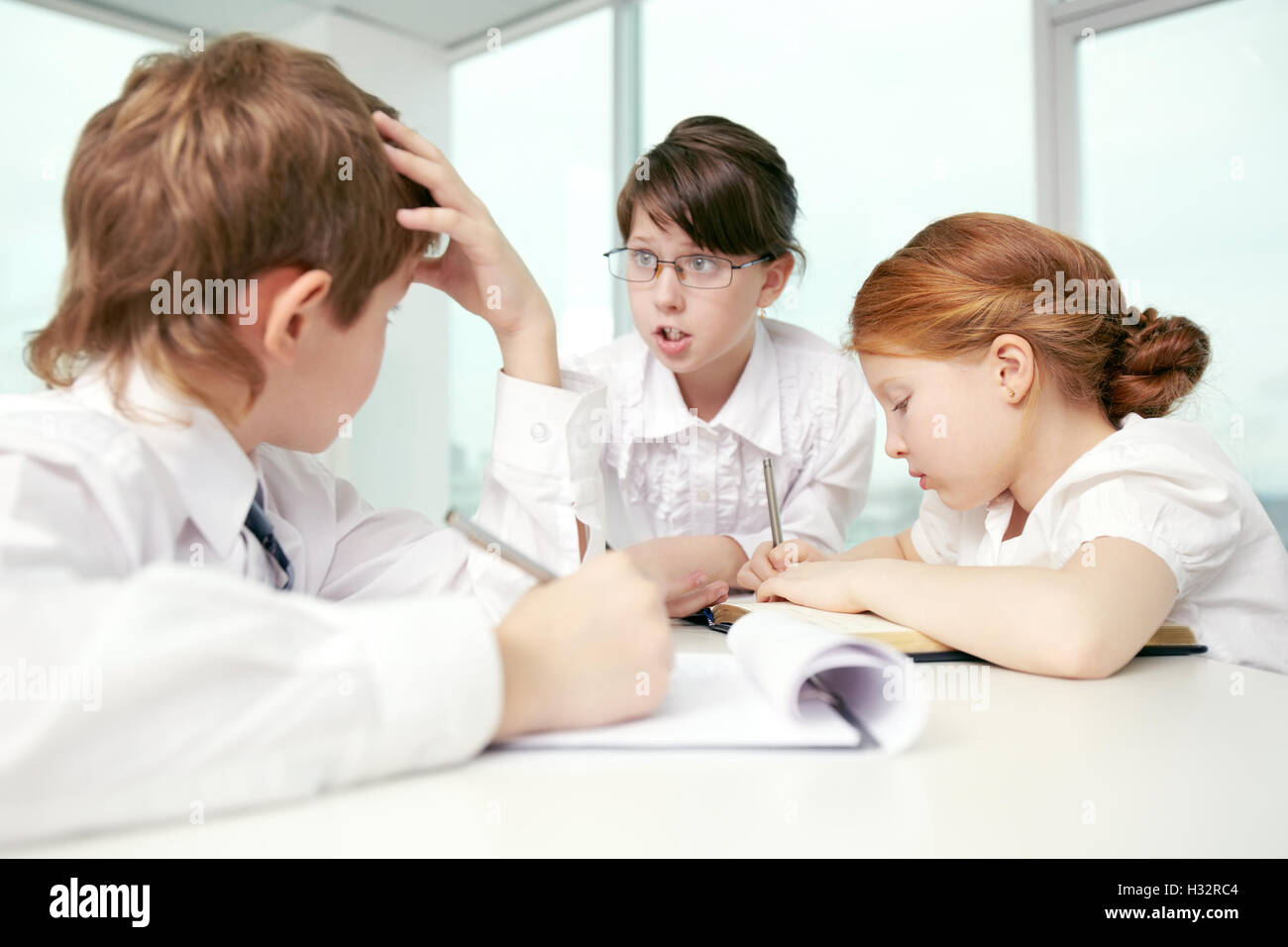 Children at discussion Stock Photo - Alamy