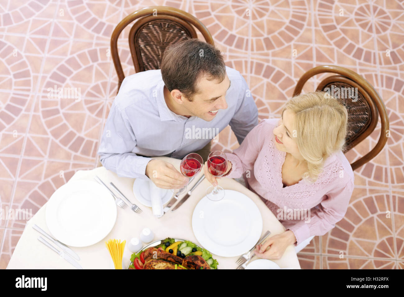 Couple at restaurant Stock Photo - Alamy
