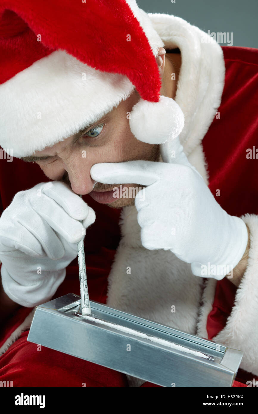 Santa and cocaine Stock Photo - Alamy