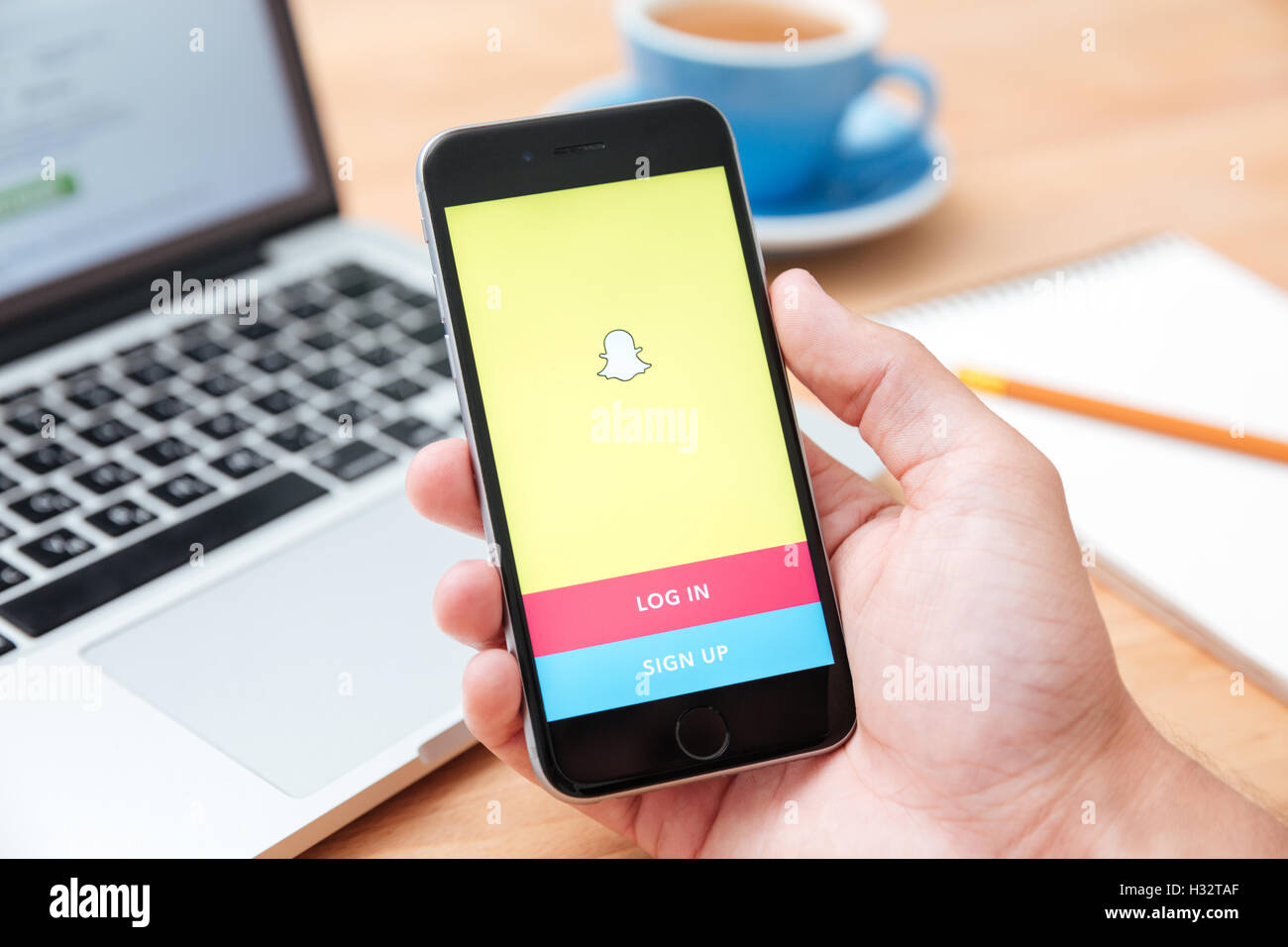 SARAWAK. MALAYSIA - APRIL 23,2016: Man holding iphone 6 showing ...