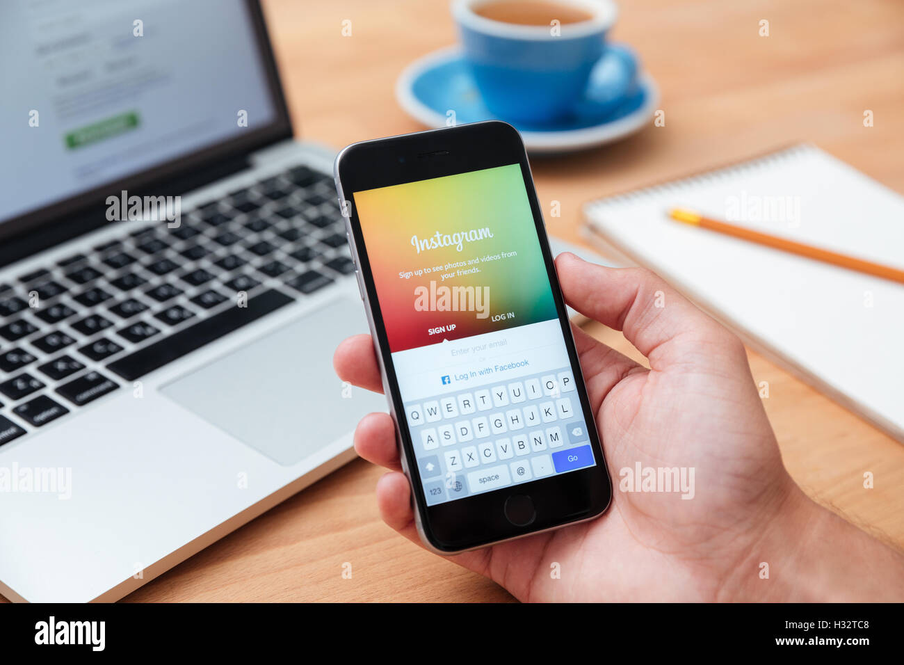 CHIANG MAI, THAILAND - JANUARY 02, 2015.Hand holding Iphone and using ...