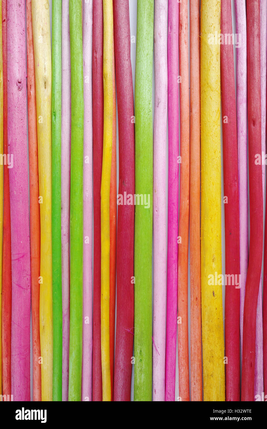 Decorative colorful wooden sticks on white background Stock Photo - Alamy
