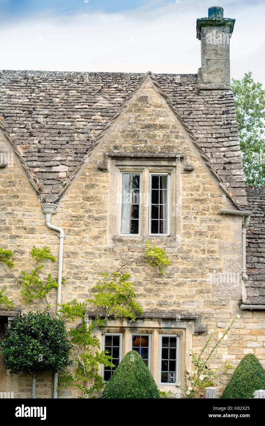 Detail of a cottage gable in the Cotswold village of Lower Slaughter ...