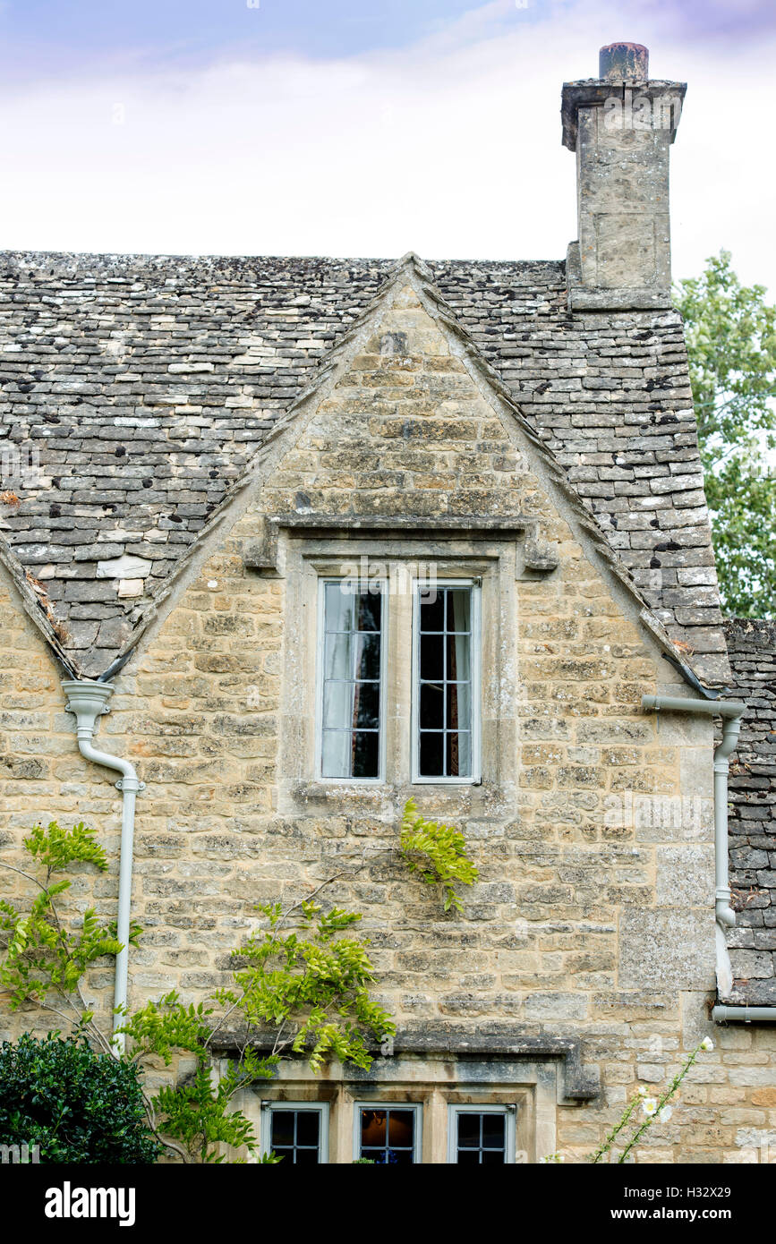 Detail of a cottage gable in the Cotswold village of Lower Slaughter ...